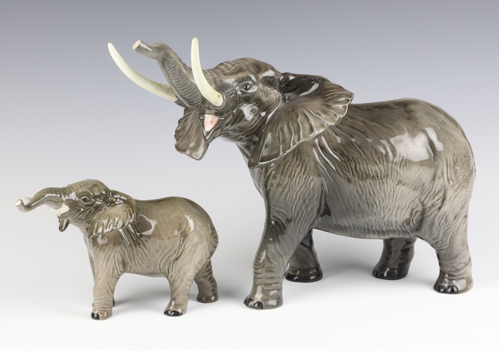 A Beswick figure of an elephant, trunk stretching, | 15th January 2025 ...