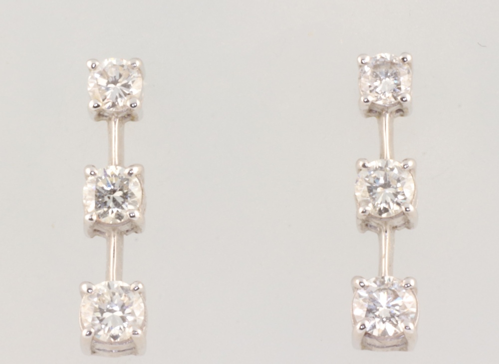A pair of white gold, testing as 18ct stamped 750, 3 | 12th February ...