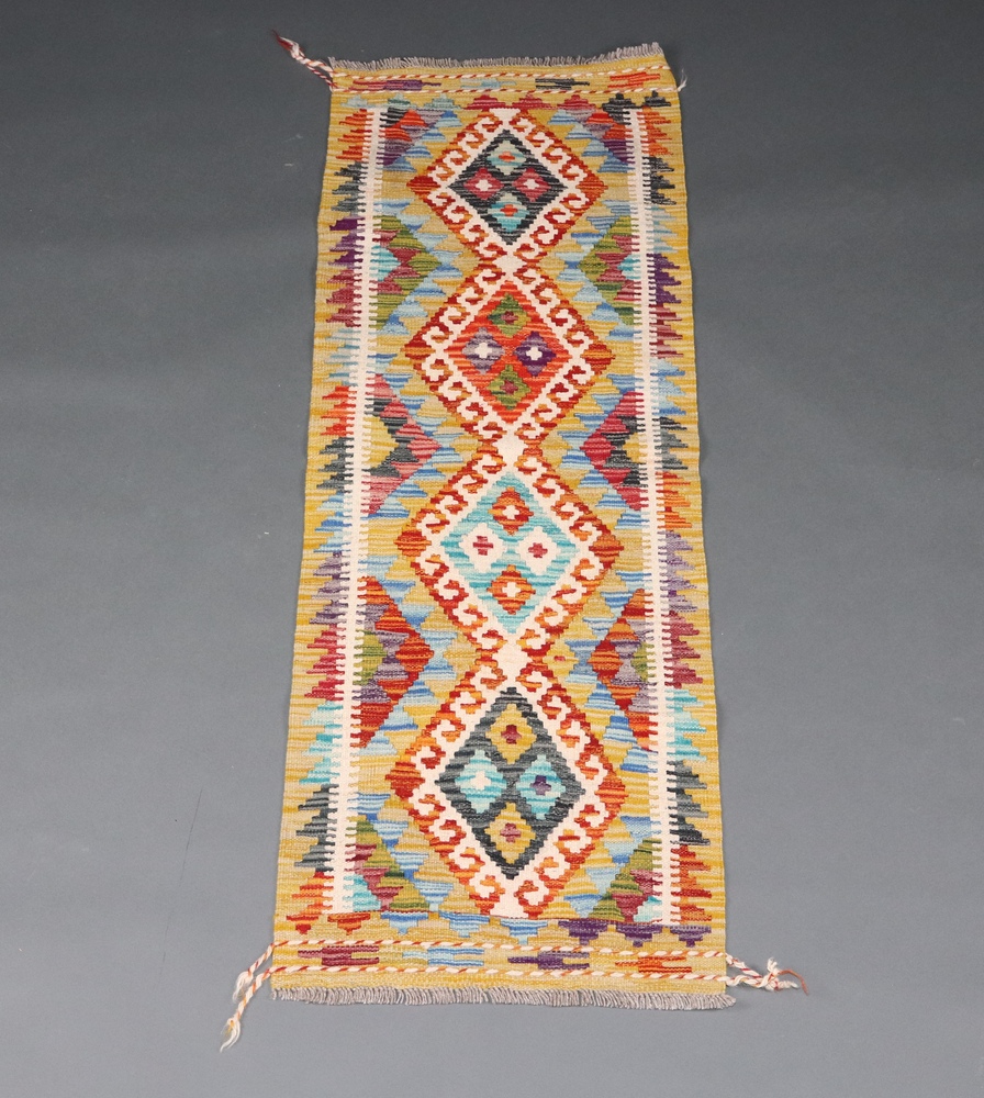 A yellow, green and orange ground Chobi Kilim runner | 12th February ...
