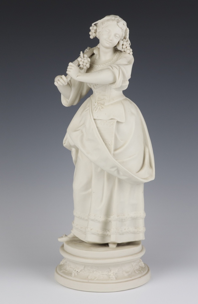A Victorian Parian figure of a standing lady holding a | 12th March ...