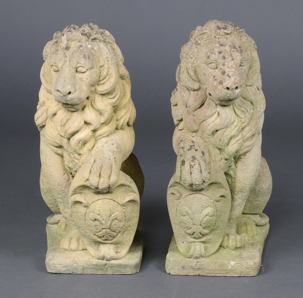 A well weathered pair of garden statues/gate post caps | 7th May 2025 ...