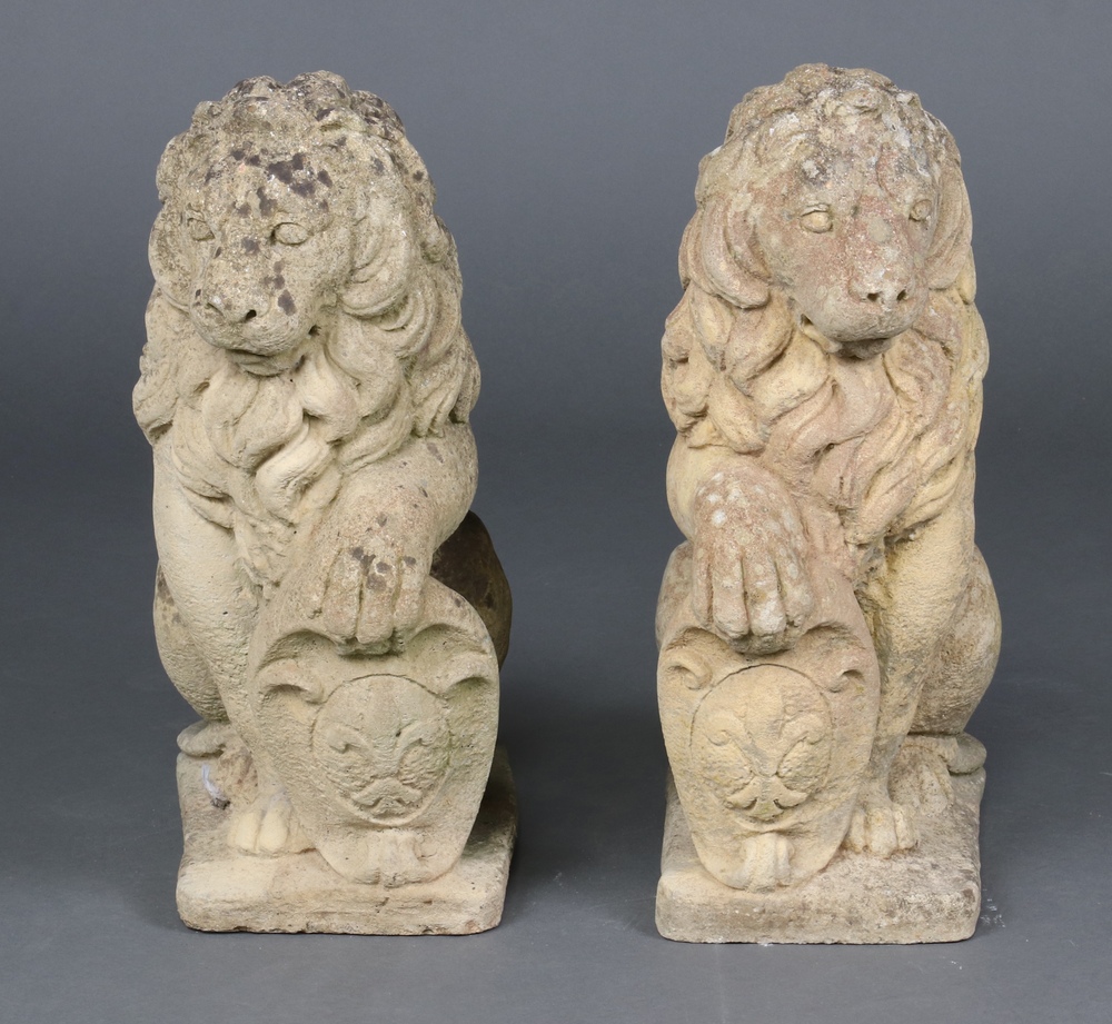 A well weathered pair of garden statues/gate post caps | 7th May 2025 ...