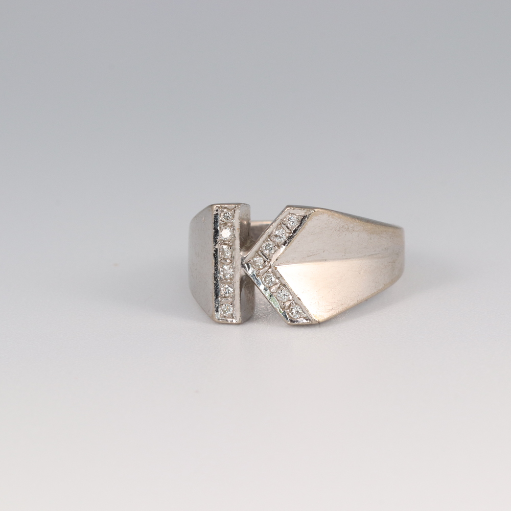 A 14ct white gold diamond set letter "K" ring, size I, | 7th May 2025 ...
