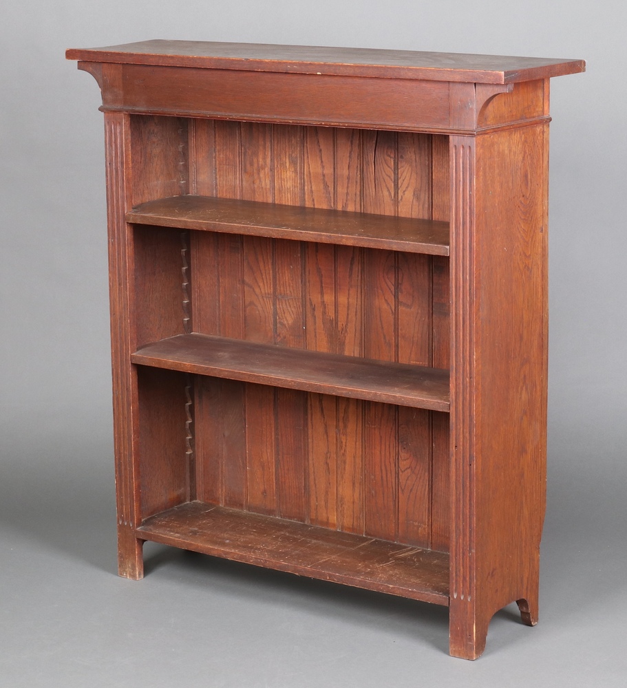 An Edwardian oak open bookcase with fluted columns to | 7th May 2025 ...
