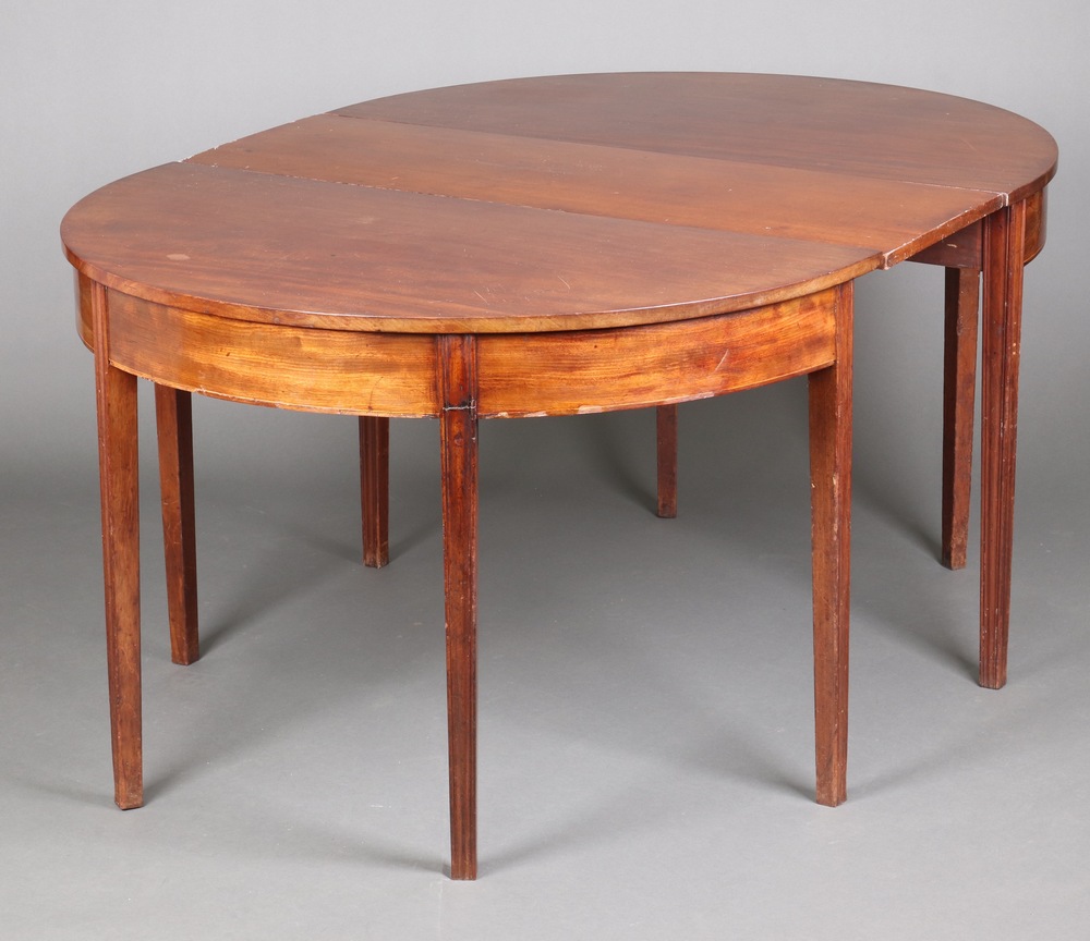 A Georgian mahogany demi-lune dining table, raised on | 2nd July 2025 ...