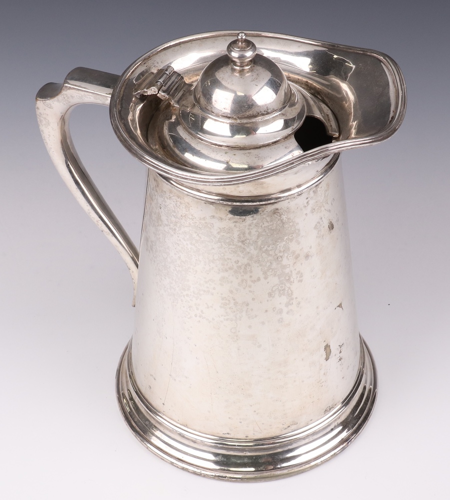 A Mappin & Webb impressive silver plated flagon with | 24th September ...