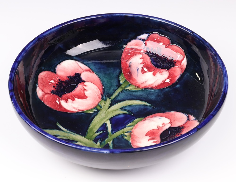 A Walter Moorcroft Poppy pattern bowl on a blue | 24th September 2025 ...
