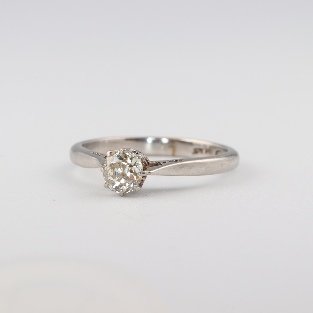 A white metal stamped Plat. single stone diamond ring, | 17th December ...